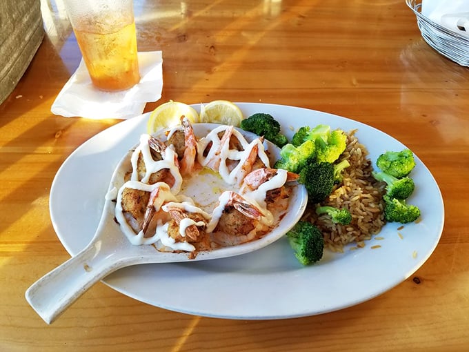 A seafood stuffed shell that's like an edible postcard from the Gulf—complete with shrimp, rice, and broccoli for those who appreciate balance.