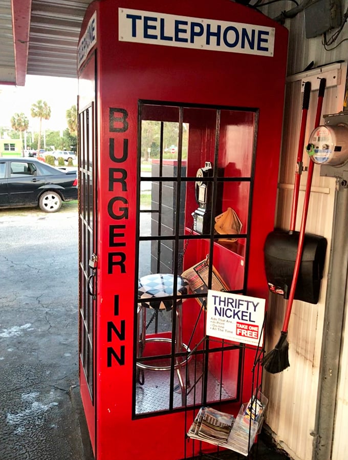 Superman had phone booths for quick changes; Burger Inn has them for quick calls. A charming relic from when "mobile" meant something entirely different.
