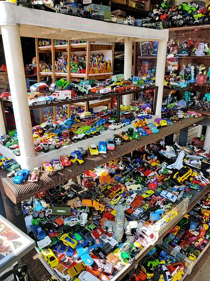 Toy cars in magnificent chaos—a miniature traffic jam of nostalgia. Every boy's childhood dream and every collector's organizational nightmare.