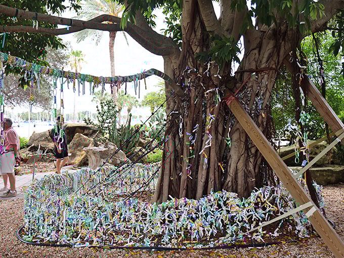 The wish tree stands draped in thousands of colorful hopes, dreams, and probably a few requests for understanding Dalí.