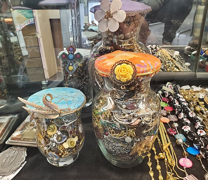 These vintage jewelry jars aren't just containers—they're time capsules of fashion history, each bauble with its own mysterious past.