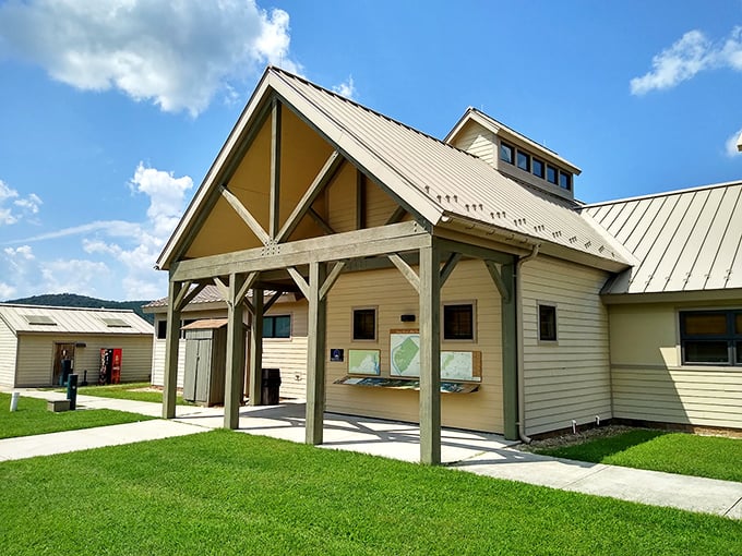 The visitor center—half rustic barn, half information headquarters. Where your adventure begins and your questions find answers.
