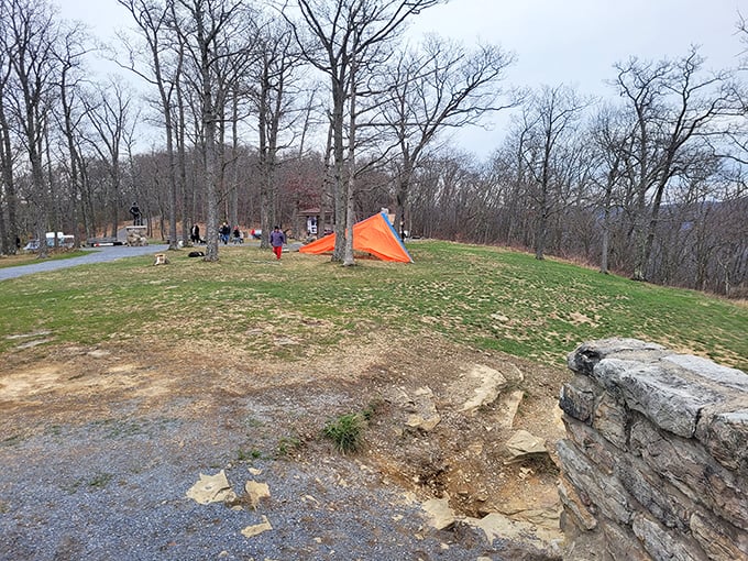 Spring brings hang gliding enthusiasts with colorful wings and even more colorful stories. The launch site doubles as Pennsylvania's most exclusive outdoor theater.