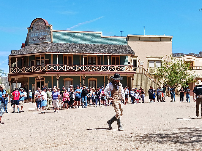 Visitors gather for the main event—a street showdown where the good guys always win, but not before some spectacular falls and theatrical gunplay.