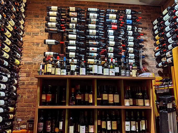 A wine wall that makes choosing feel like a delightful treasure hunt. Indiana Jones would skip the ark for these bottles.