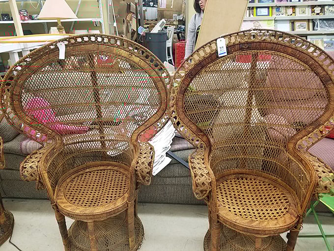 Twin peacock chairs fit for 1970s royalty. Sit in one of these, and you're instantly the coolest person at any gathering.