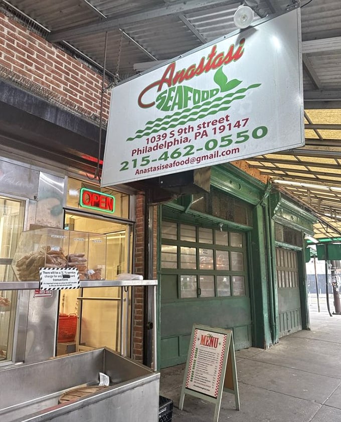 Green storefront, big flavors – proof that the best seafood often comes from the smallest spaces.