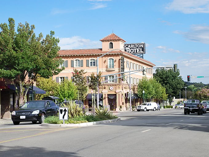 The Carlton Hotel stands like Atascadero's Spanish grandmother—elegant, imposing, and definitely judging your outfit.