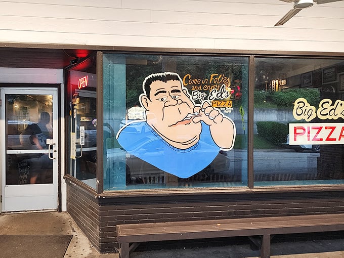 Big Ed's cartoon mascot has welcomed hungry folks for generations. That friendly face promises pizza satisfaction inside.