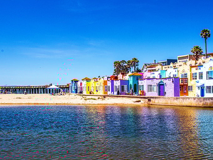Capitola's rainbow houses reflect pure joy in the sparkling waters of Monterey Bay.