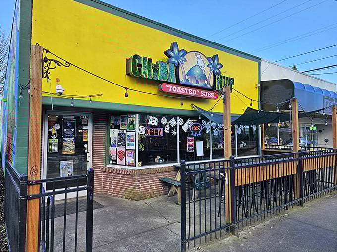 Cheba Hut's tropical yellow storefront brings island vibes to Eugene's college town energy and atmosphere.