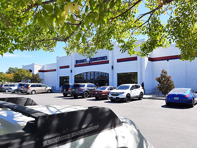 Deseret Industries' clean white facade promises an organized thrifting experience. This Sacramento location feels more department store than secondhand shop.