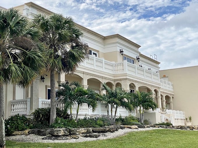 Southern mansion meets beachside elegance! Dry Dock's grand white columns and sweeping balconies create the perfect setting for sophisticated seafood dining.