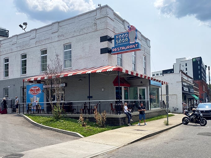 The red and white striped awning frames a doorway to Nashville's sweetest piece of living history.