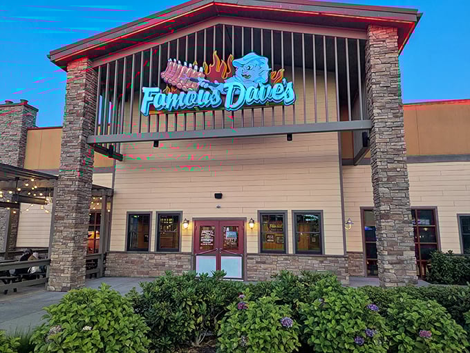 The familiar stone facade delivers reliable barbecue comfort that families can count on for satisfying weekend dinner traditions.