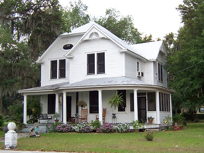 Fort Meade's classic white farmhouse with wraparound porch represents the affordable housing that makes this town retirement-friendly.
