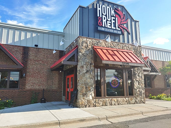 Hook & Reel's bold signage doesn't mess around—that crab means business, and so does the Cajun seafood waiting inside.