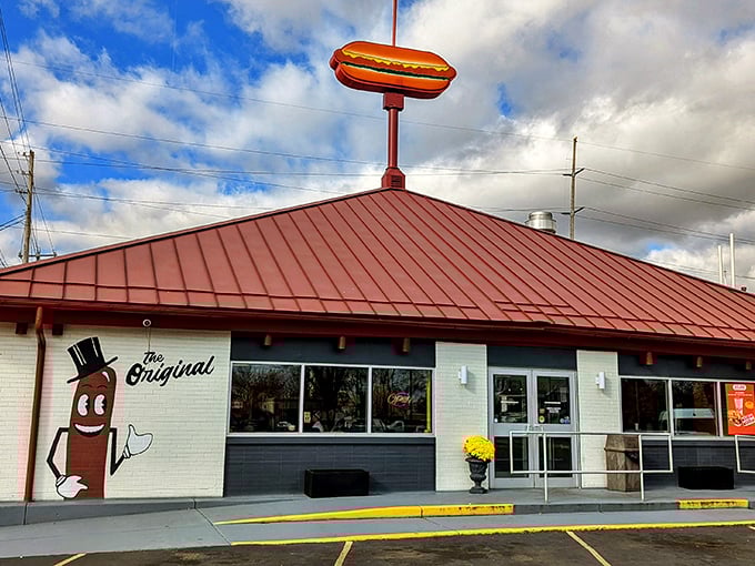 The Original's giant hot dog sign stands proud like a delicious monument to American comfort food.