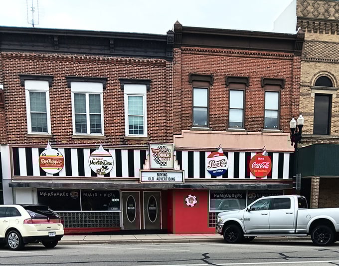 Mom's Diner rocks that classic 50s vibe harder than Elvis at his prime—black and white stripes up top, cherry-red sass below, and flavor all the way through.