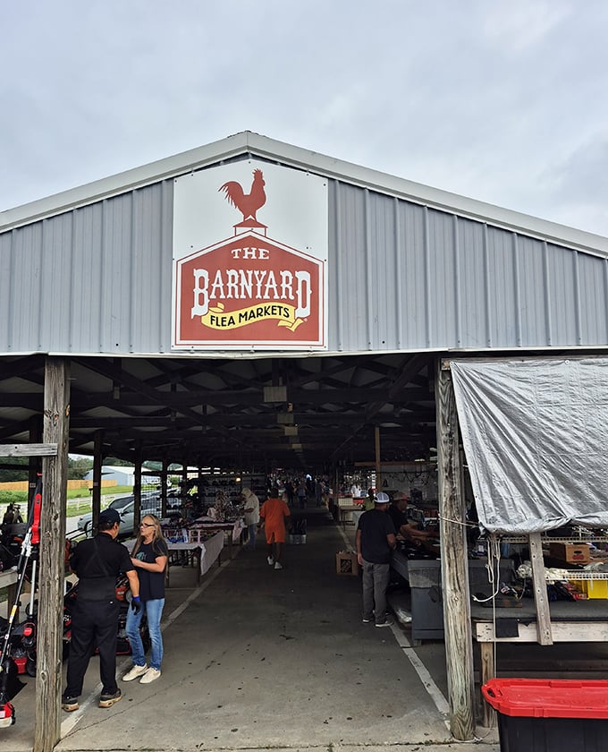 The Barnyard's red rooster logo perches proudly, welcoming visitors to authentic country market charm below.