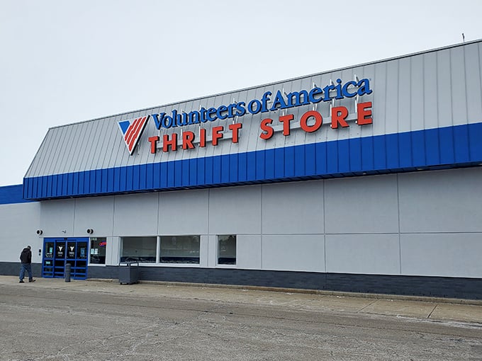 The massive Volunteers of America sign towers like a lighthouse guiding shoppers to incredible bargain shores.