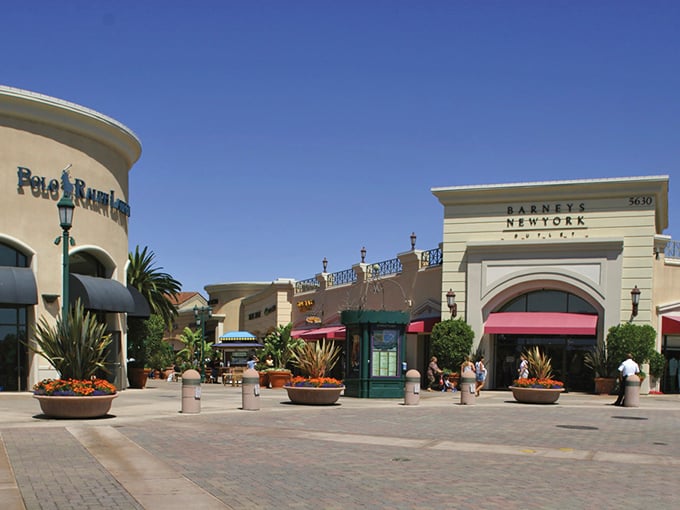 The mountain backdrop at Carlsbad Outlets turns a simple shopping trip into a scenic adventure. Those aren't just stores—they're treasure chests!