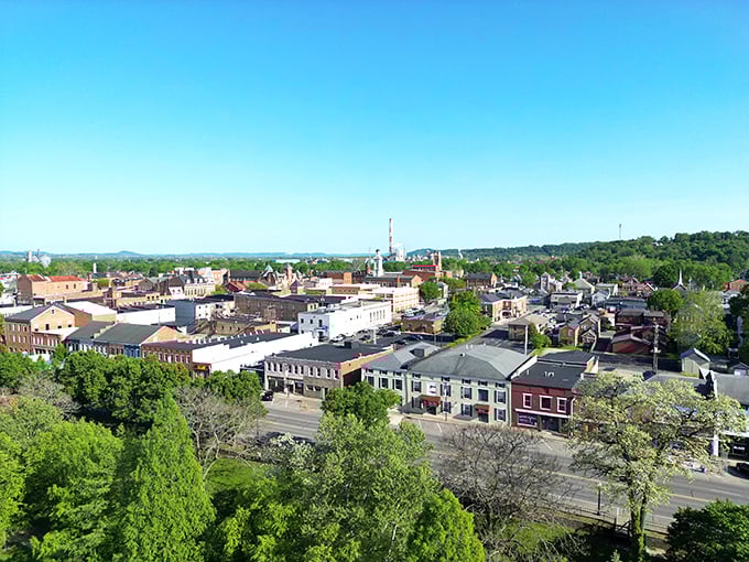 Valley of value! Chillicothe's rooftops spread below like a retirement planner's dream map—affordable living nestled in nature's embrace.