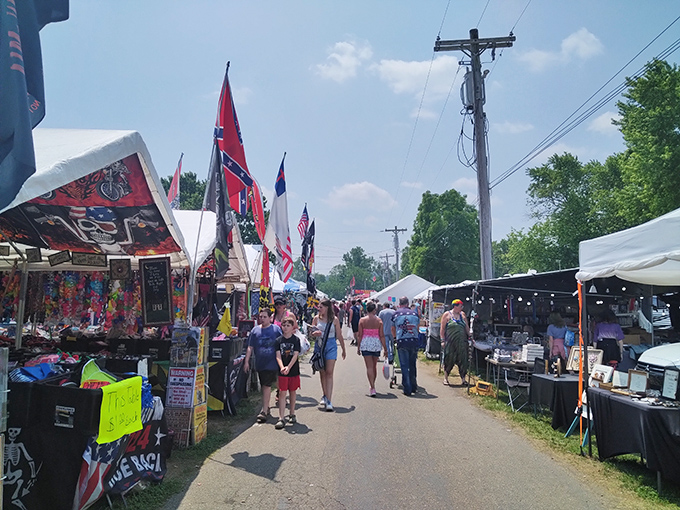 The bustling crowd scene captures the festival atmosphere that makes Friendship's market days so special.