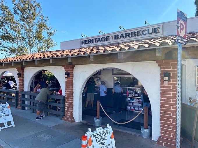 Those elegant arches frame more than just a restaurant – they're the gateway to BBQ artistry at its finest.