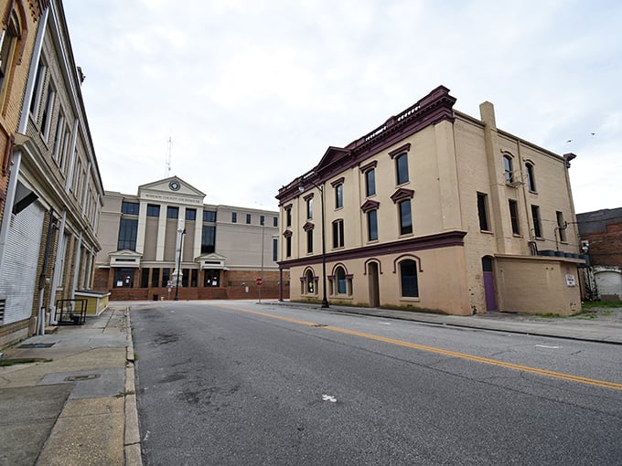 Historic buildings line Lumberton's quiet streets, where architectural dignity meets retirement affordability in perfect southern harmony.
