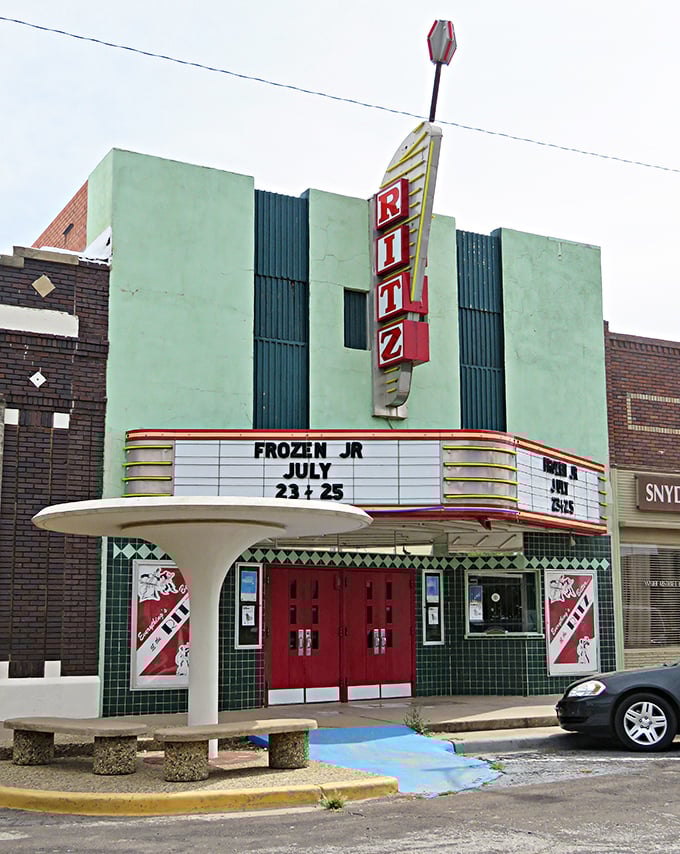 The vintage marquee of Snyder's Ritz Theater still announces upcoming shows, a neon reminder of simpler entertainment in a Netflix world.