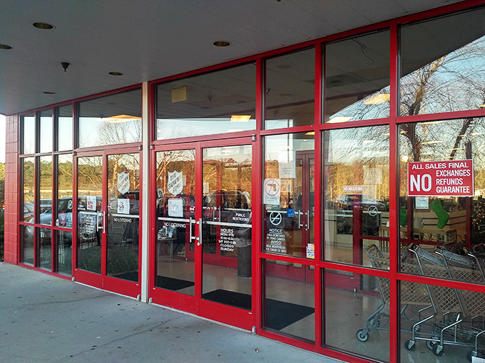 Behind these glass doors, yesterday's trends await their second act. The red entrance is like a runway to affordable style.
