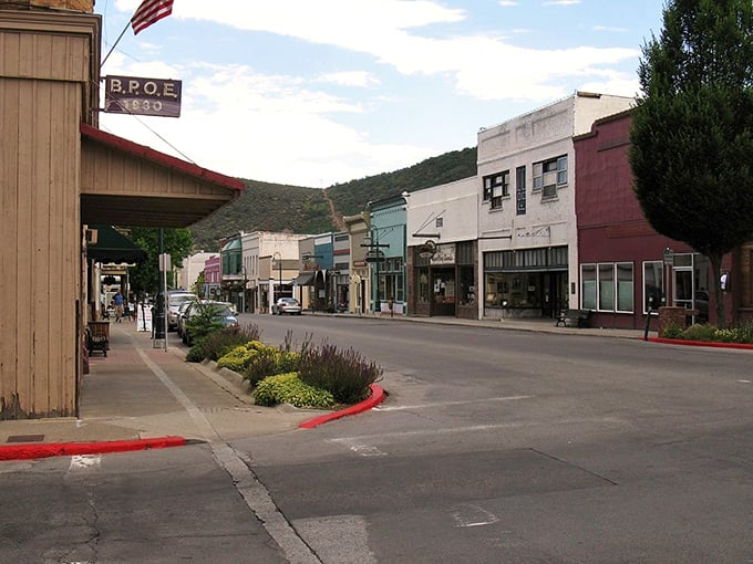 Victorian storefronts and mountain backdrops create the perfect setting for budget-conscious golden years.