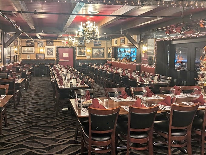 The dining room whispers of celebrations past and future—where chandelier light dances off burgundy napkins and anticipation hangs in the air.