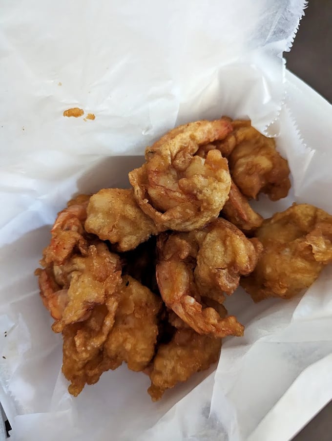 Golden treasures from the deep! These perfectly fried shrimp are what food dreams are made of—crispy outside, tender inside, impossible to stop eating.