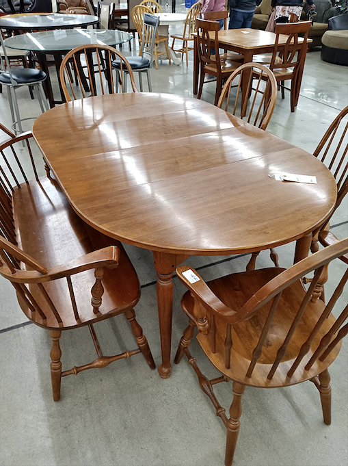This isn't just a dining set – it's decades of family dinners, holiday gatherings, and homework sessions waiting for its next chapter.