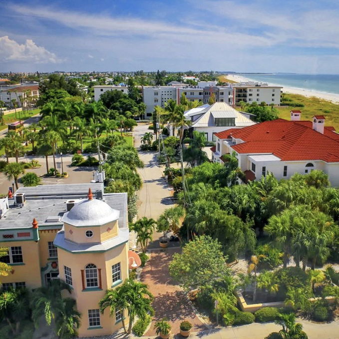 Old Florida architecture thrives here, where Mediterranean-inspired buildings with terra cotta roofs stand as colorful sentinels against the azure sky.