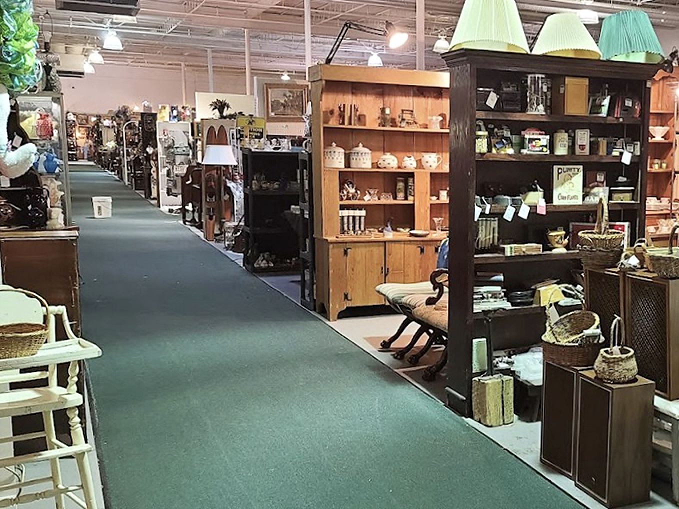 Green carpeted pathways lead you through this labyrinth of yesteryear, where every booth is its own miniature museum of American life.