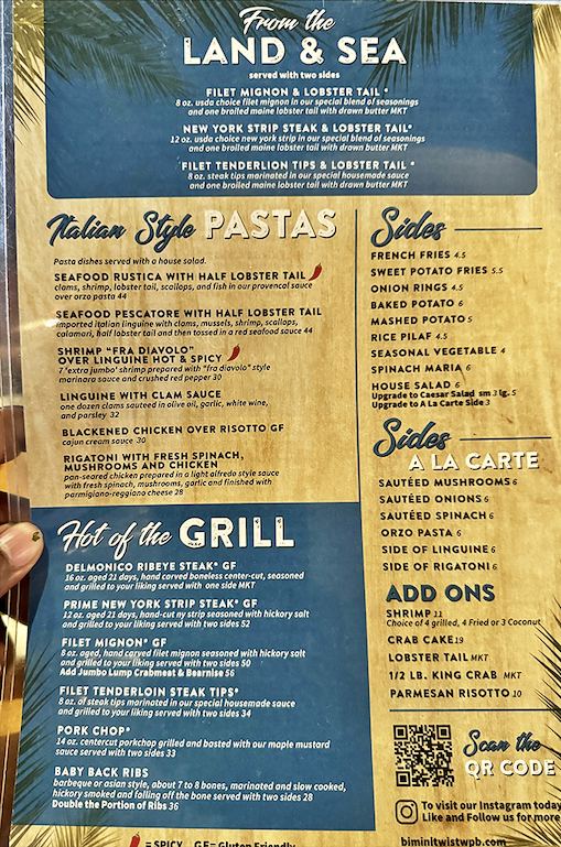 The menu reads like a love letter to the ocean, with "From the Land & Sea" options that make choosing just one dish the day's hardest decision.