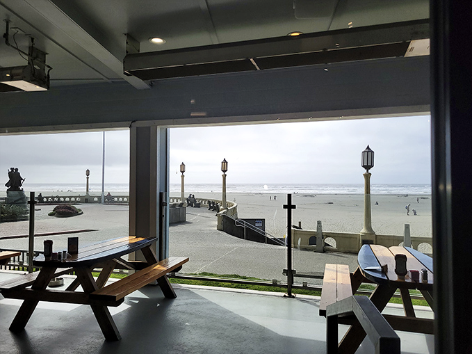 Where dining meets oceanfront theater—Mo's panoramic windows frame Seaside's beach like a living postcard that changes with every tide.