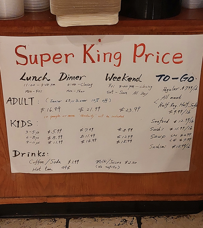 The handwritten menu board tells you everything you need to know—this place prioritizes feeding you well over fancy typography or designer aesthetics.