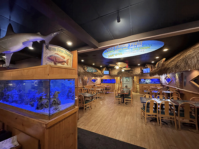 Step inside and you're transported to an underwater wonderland – complete with aquariums that make waiting for your food an adventure itself.