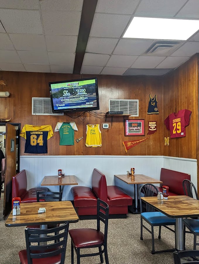 Where sports memories line the walls. The wood-paneled interior with its red vinyl booths feels like stepping into your favorite uncle's basement—if he could really cook.