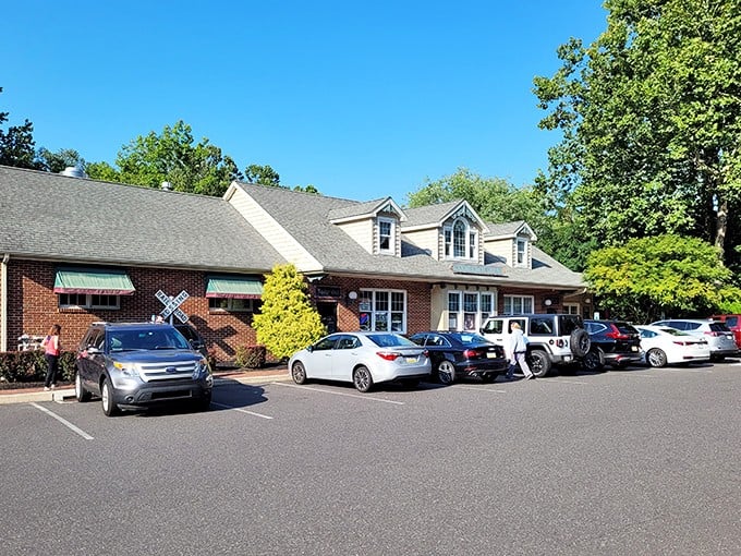 The bustling parking lot tells the story before you even step inside—locals know this place is worth every minute of the wait.