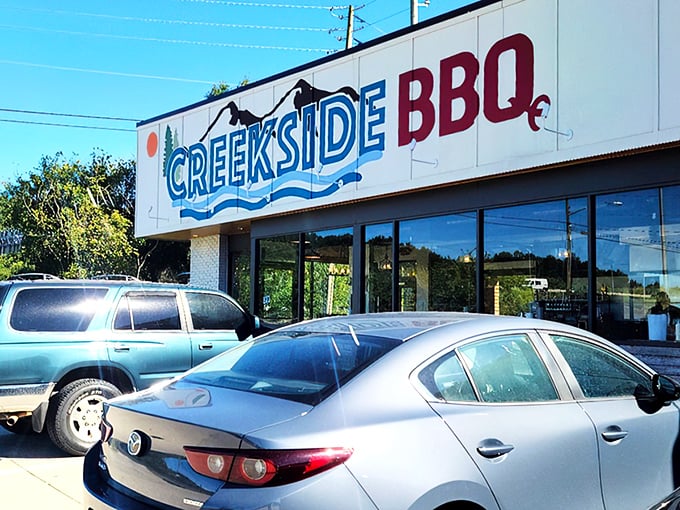 The unassuming storefront of Creekside BBQ might fool you, but locals know this is where smoke signals spell "come hungry, leave happy." 
