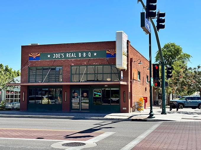 The brick facade of Joe's Real BBQ stands like a barbecue beacon in downtown Gilbert, promising smoky treasures within those hallowed walls.