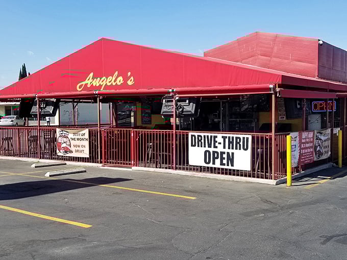 The iconic red awning of Angelo's stands out against the Anaheim sky like a beacon for burger enthusiasts seeking refuge from theme park food.