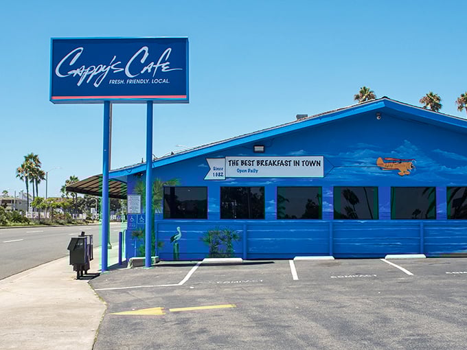 That iconic blue exterior isn't just a building—it's a beacon of breakfast hope along PCH, promising pancake salvation to hungry travelers.