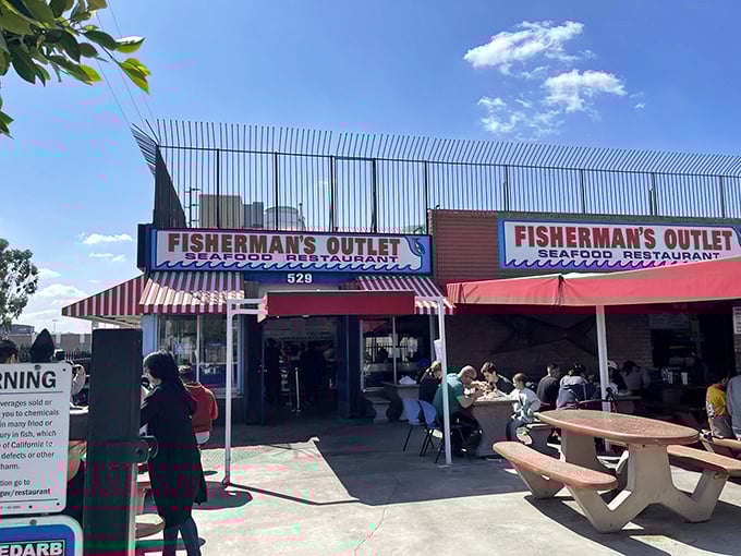 That classic red-and-white striped awning isn't just charming—it's a beacon calling seafood lovers from miles around.