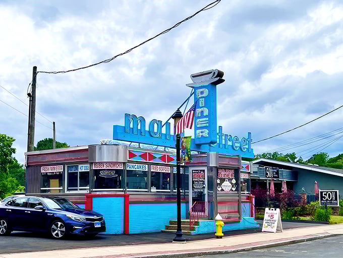 The iconic blue and red exterior of Main Street Diner stands out like a beacon of breakfast hope on Plainville's main drag.